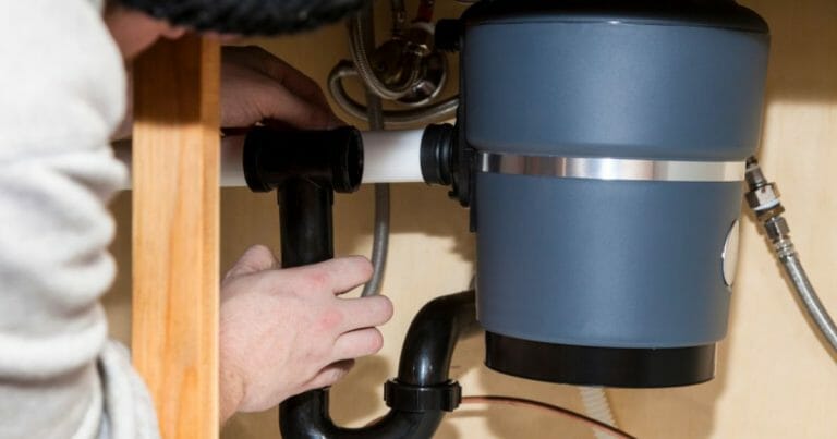 How to Unclog a Garbage Disposal With Standing Water